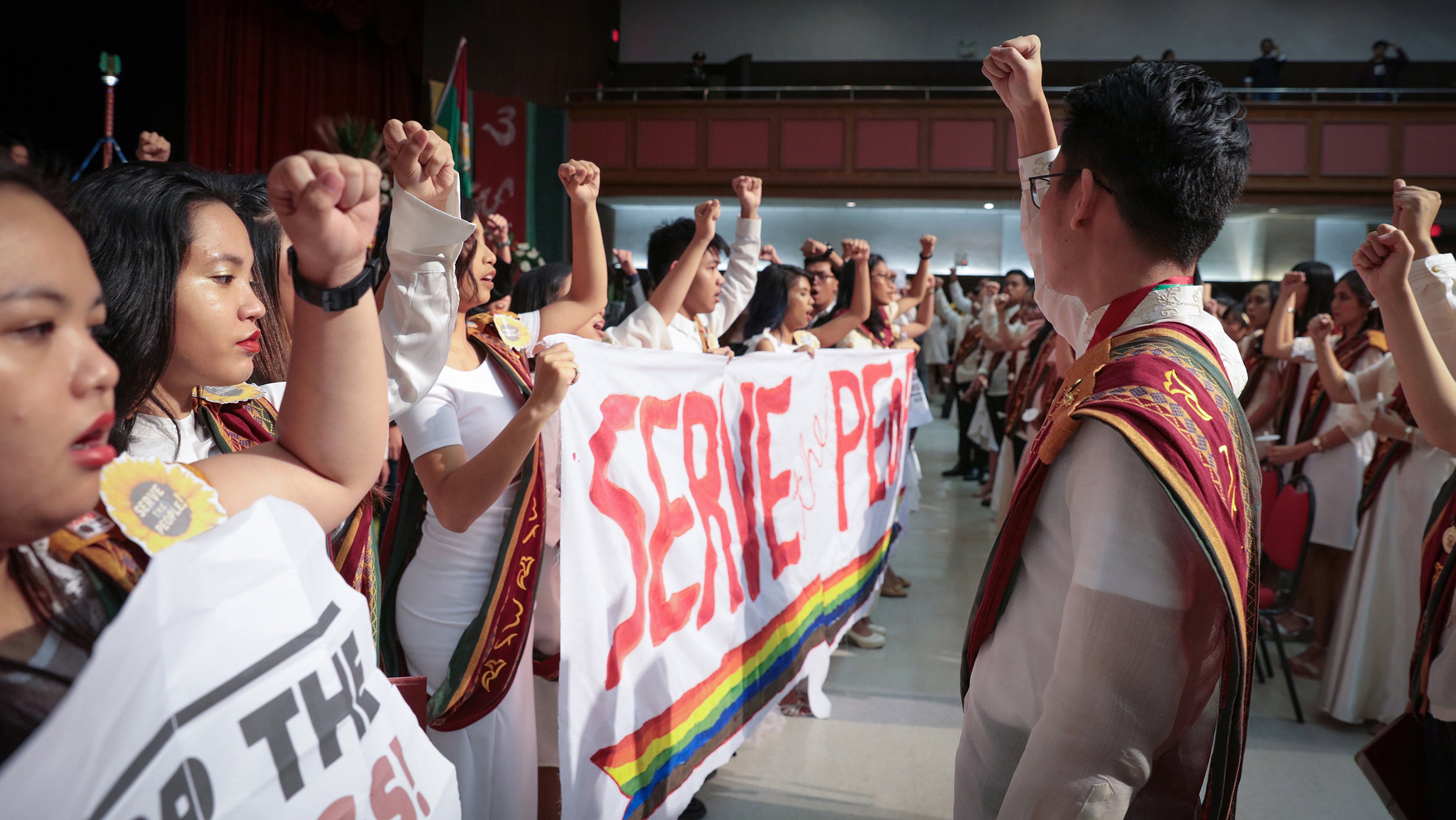 The graduates of UP Baguio mount a lightning rally at the end of the ...
